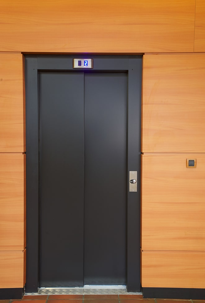 SD130 : La porte d'ascenseur qui optimise l'espace cabine ! - Slycma